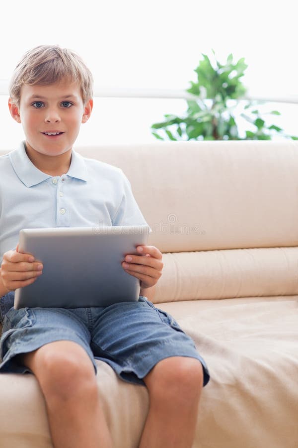 Portrait of a Cute Boy Using Tablet Computer Stock Photo - Image of ...