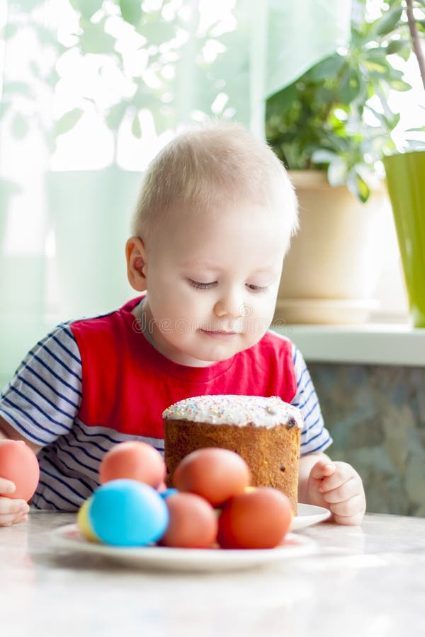 Portrait of a Cute Child with Easter Eggs. Easter Lunch Stock Photo ...