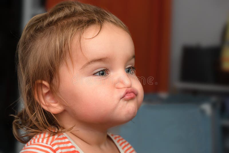Portrait of a Cute Child with a Grimace Stock Image - Image of ...