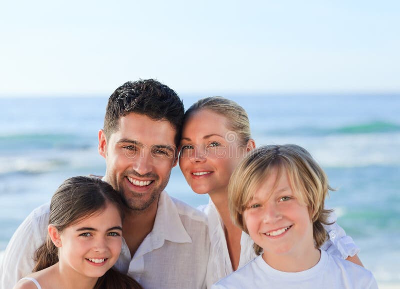 Portrait of a Cute Family at the Beach Stock Image - Image of leisure ...