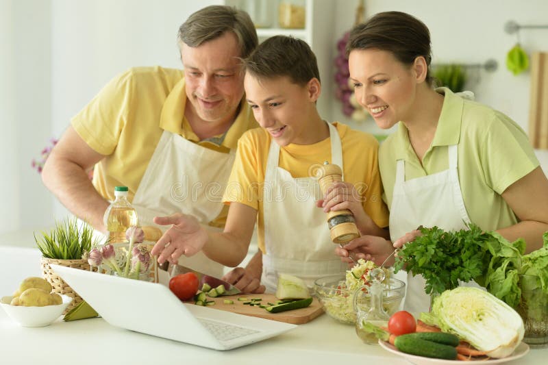 Portrait of Cute Family Cooking Together in Kitchen Stock Image - Image ...