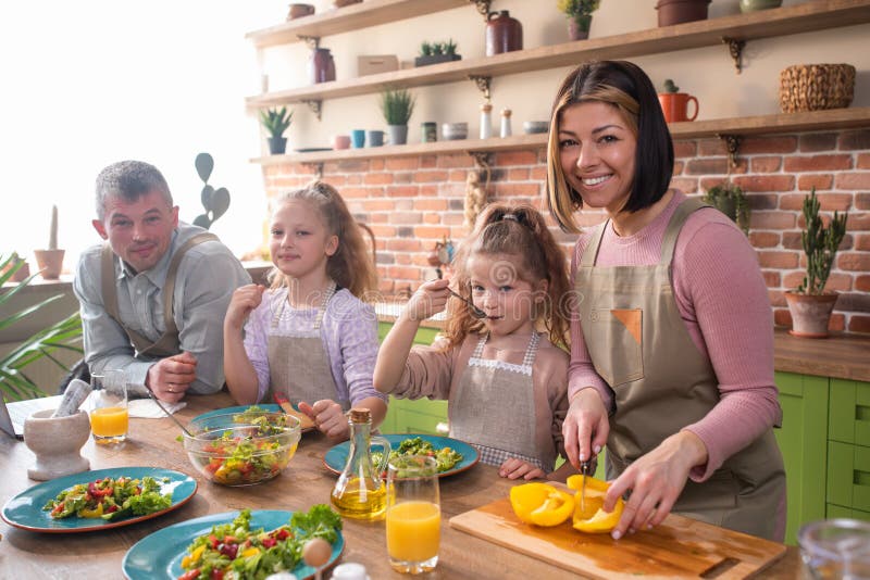 Portrait of Cute Family Cooking Together in Kitchen Stock Image - Image ...