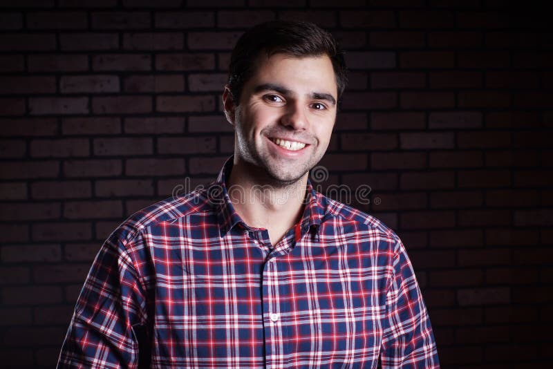 Portrait of Cute Funny Young Guy in a Plaid Shirt Stock Photo - Image ...