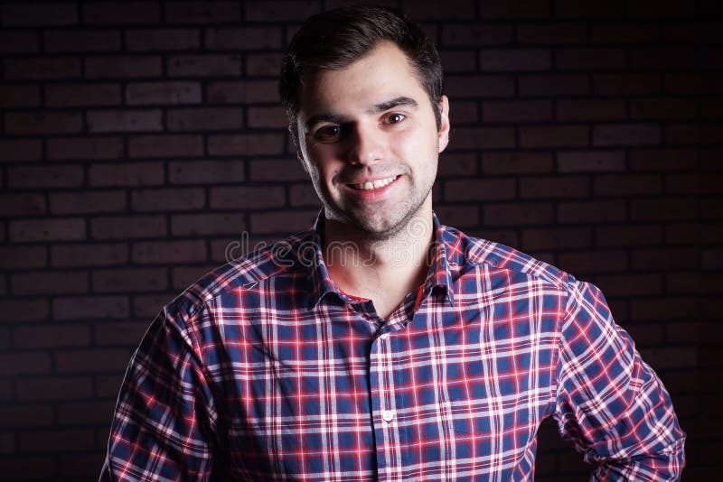 Portrait of Cute Funny Young Guy in a Plaid Shirt Stock Photo - Image ...