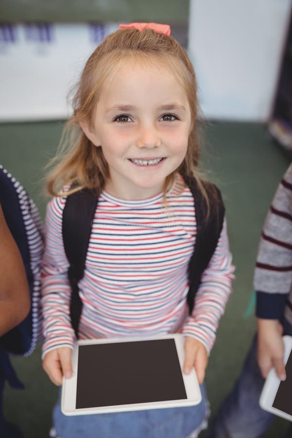 Portrait of Cute Girl Standing with Digital Tablet Stock Image - Image ...