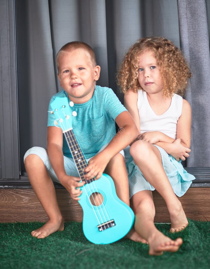 Portrait of a Cute Kids with Ukulele Stock Image - Image of instrument ...