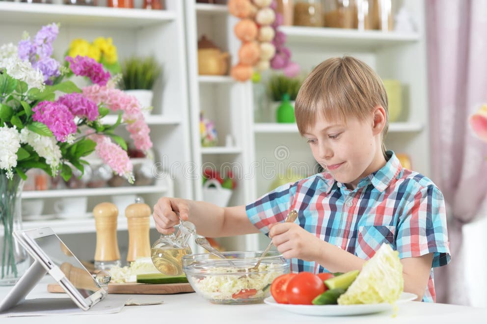 Portrait of Cute Little Boy Making Dinner Stock Image - Image of ...