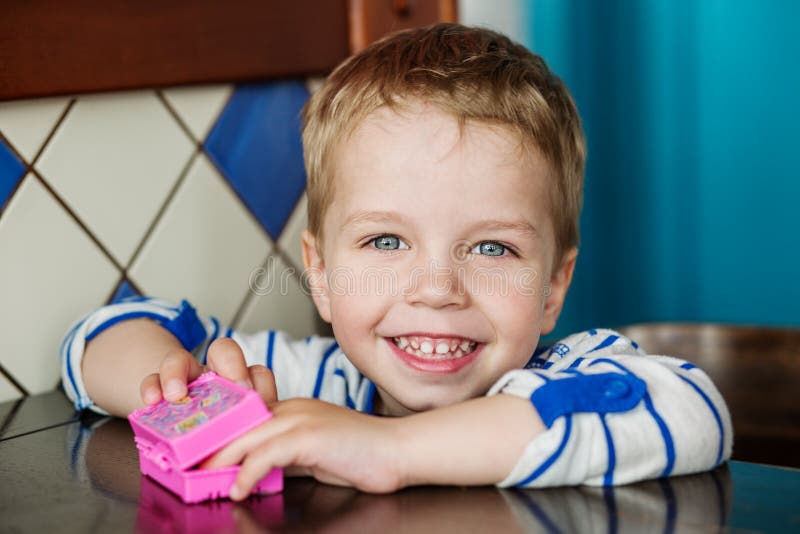 Portrait of Cute Little Boy Playing Stock Image - Image of preschooler ...
