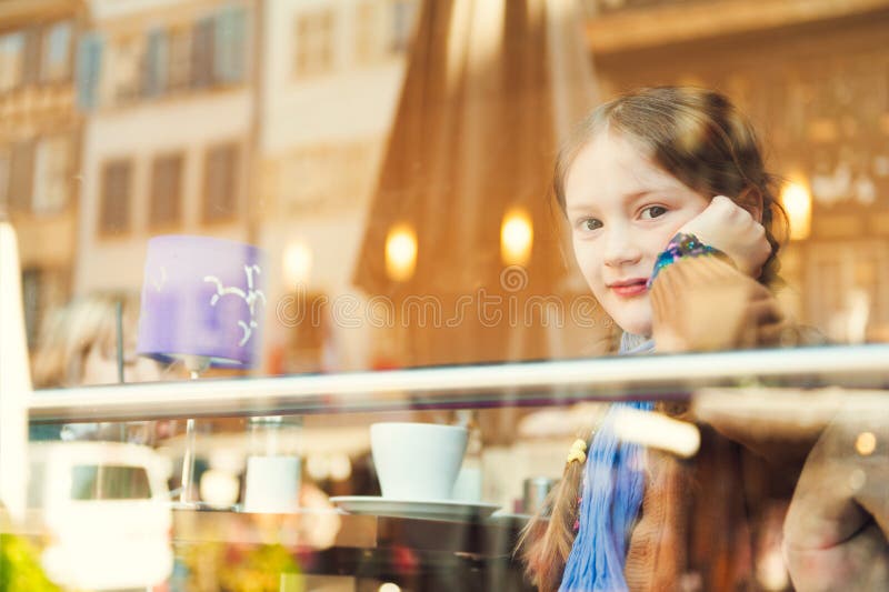 Portrait of a Cute Little Girl Stock Image - Image of casual, cafe ...