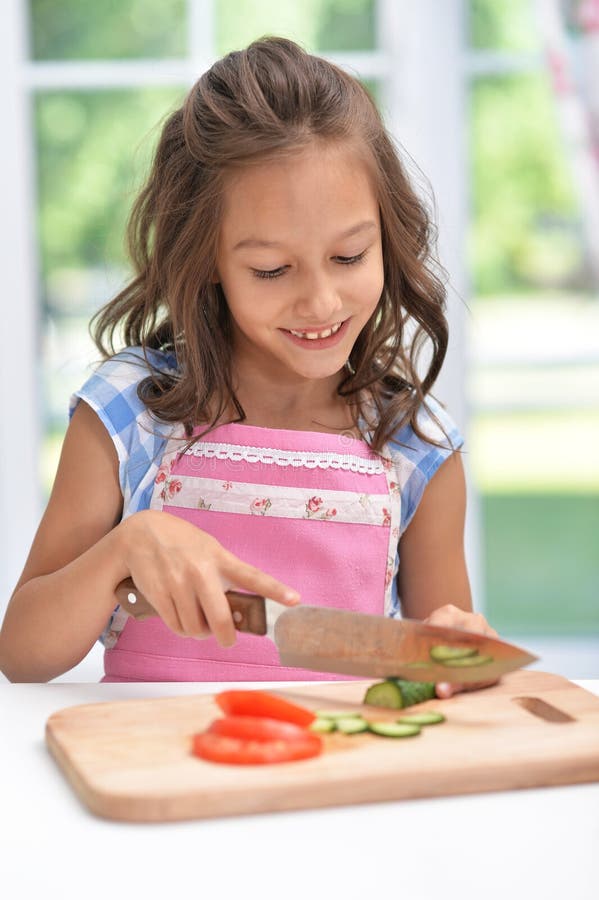 Portrait of Cute Little Girl Making Dinner Stock Image - Image of ...