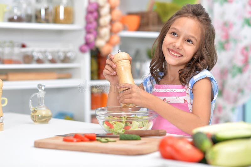 Portrait of Cute Little Girl Making Dinner Stock Image - Image of ...