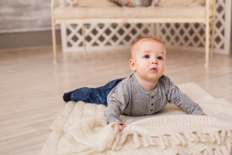Portrait of a Cute 6 Months Baby Boy Stock Photo - Image of blanket ...