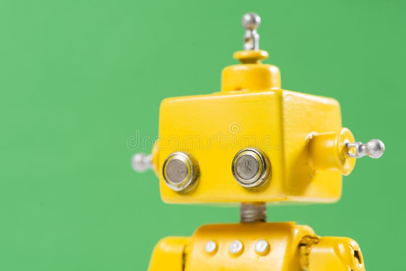 Robot on a Yellow Background Stock Photo - Image of copy, robots: 136201864