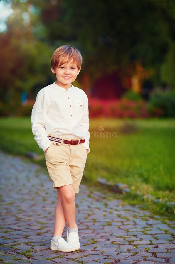 Portrait of Cute Young Fashionable Boy Posing Outdoors Stock Photo ...
