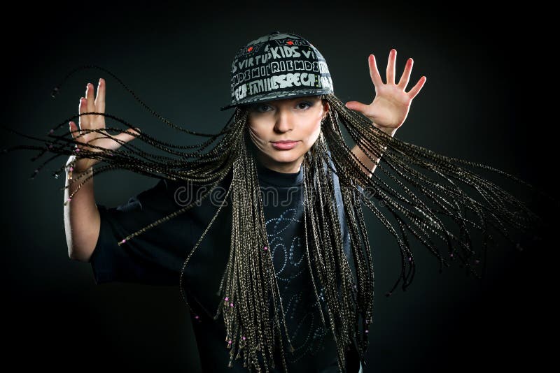 Portrait of Dancing Girl with Dreadlocks in Cap Stock Photo - Image of ...