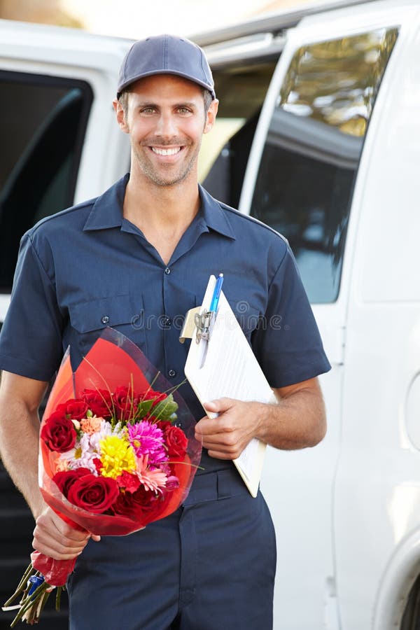Portrait of Delivery Driver with Flowers Stock Image - Image of ...