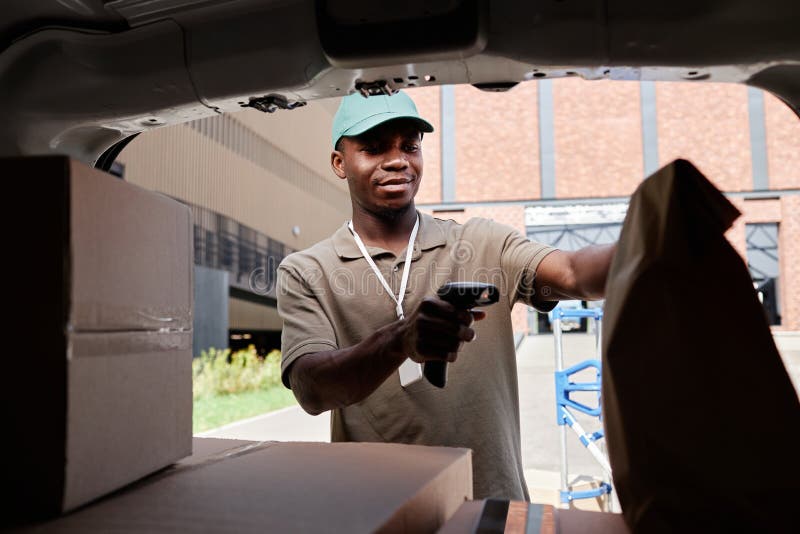 Delivery Worker Scanning Codes Stock Photo - Image of delivering ...
