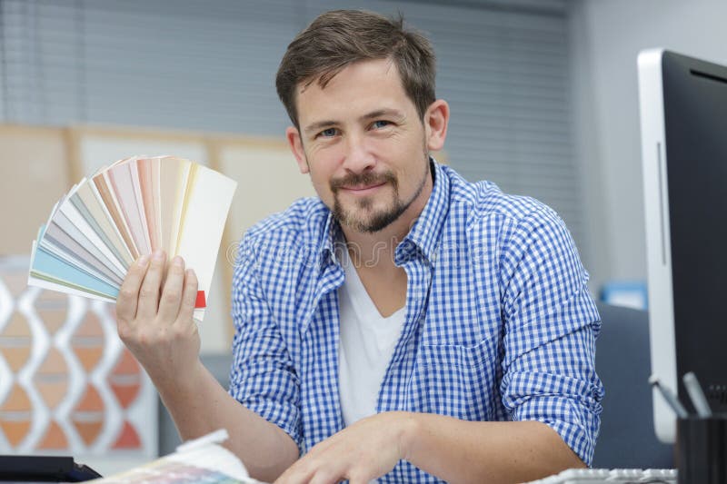 Portrait Designer Holding Color Swatch in Office Stock Photo - Image of ...