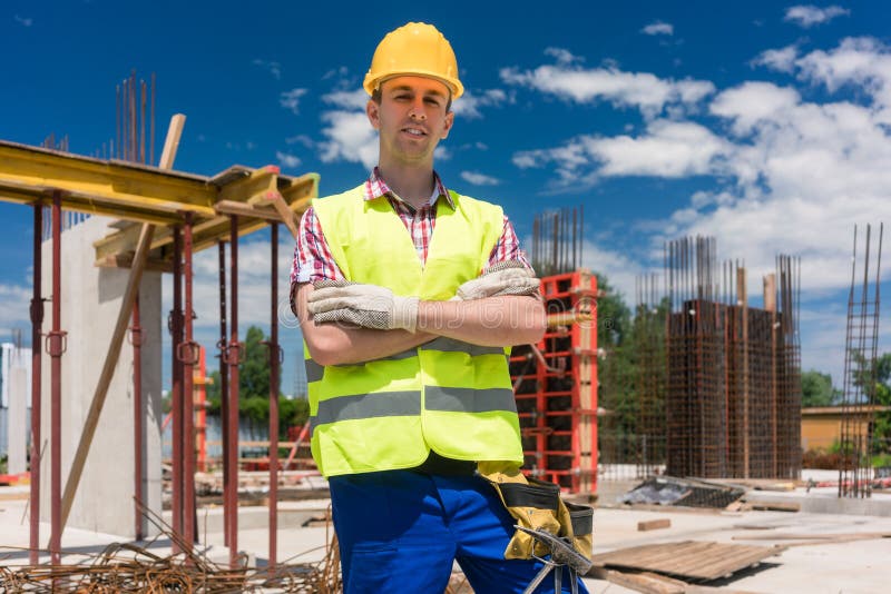 Portrait of a Determined Young Worker Looking at Camera with Con Stock ...