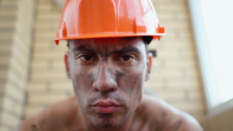 Portrait of a Dirty Construction Worker in Hard Hat. Tired Builder ...