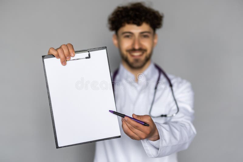 Portrait of Doctor Man Showing Blank Empty Copy Space Paper Document ...