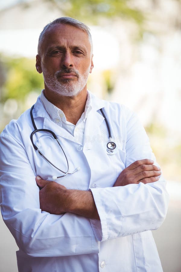 Portrait of a Doctor with Arm Crossed Stock Image - Image of adult ...