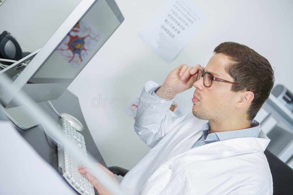 Portrait Doctor Using Computer Stock Image - Image of friendly ...