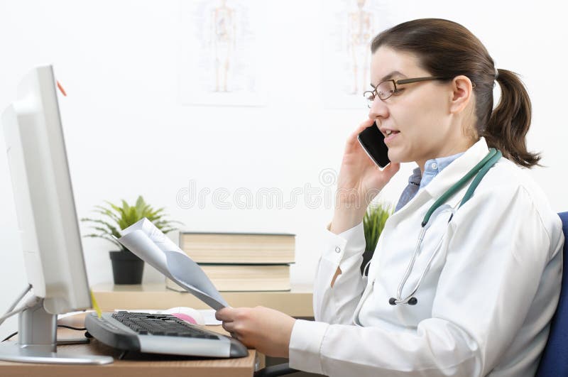 Portrait of a Doctor Using Mobile Phone Stock Image - Image of ...
