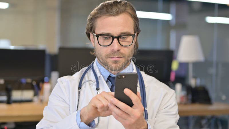 Portrait of Doctor Using Smartphone for Internet Stock Photo - Image of ...