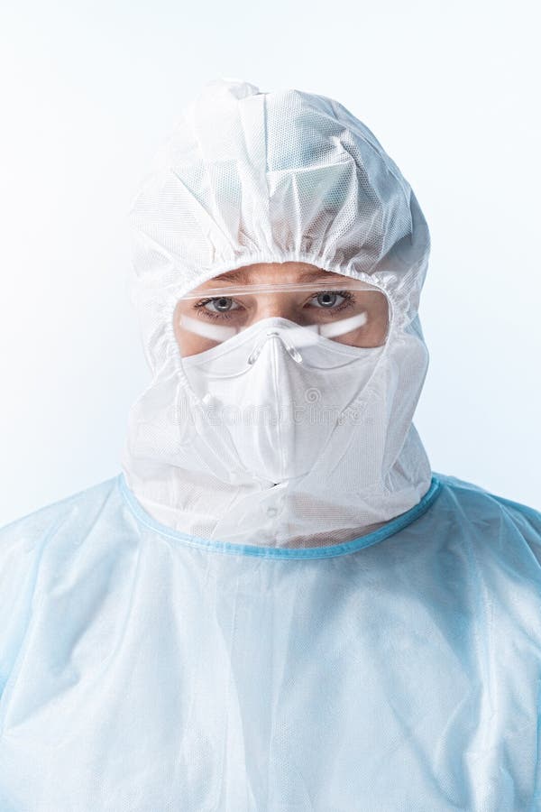 Doctor Wearing Protecting Suit and Mask on Blue Back Stock Image ...