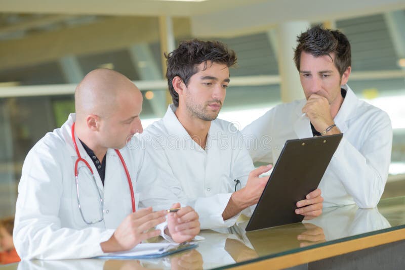 Portrait Doctors Having Reunion Stock Photo - Image of compare, doctors ...