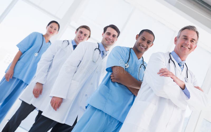 Portrait of Doctors Standing in a Row at Hospital Stock Image - Image ...