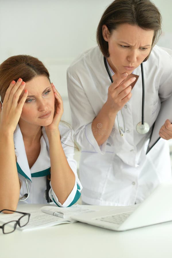 Portrait of Doctors at Work in Hospital Stock Image - Image of ...