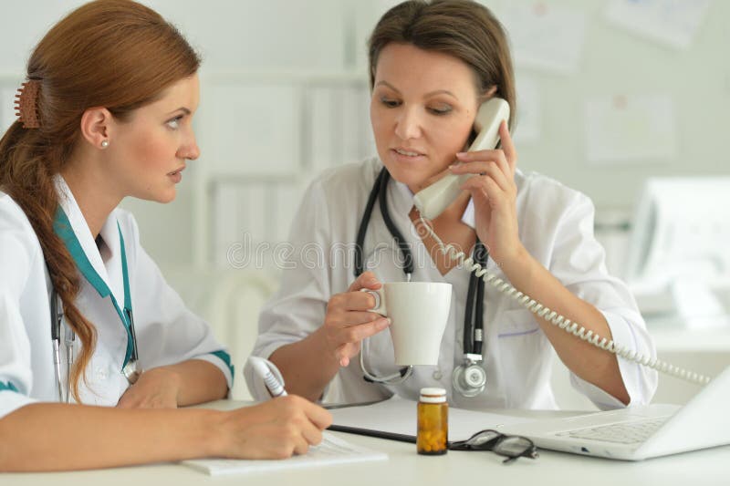 Portrait of Doctors at Work in Hospital Stock Photo - Image of hospital ...
