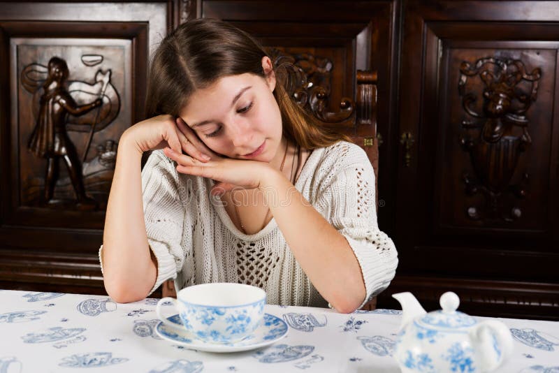 Portrait of a Dreamy Young Brunette with Tea Cup. Stock Image - Image ...