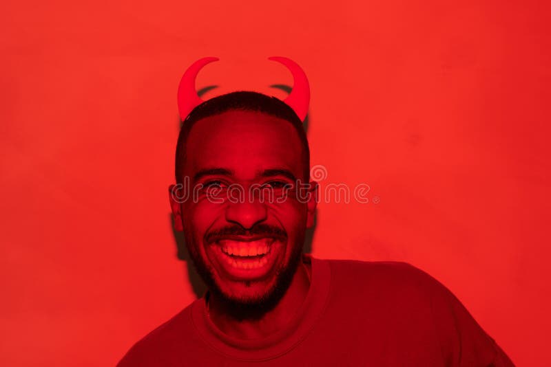 Devil Guy with Crooked Smile Stock Photo - Image of humor, happiness ...