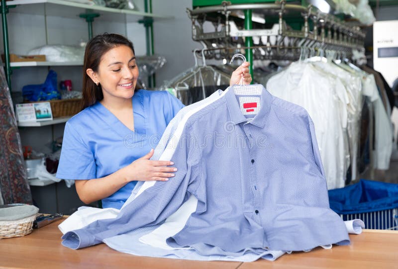 Portrait of Efficient Friendly Female Laundry Worker at Workplace Stock ...