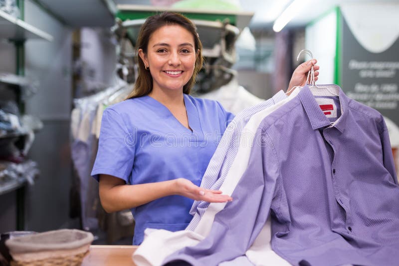 Portrait of Efficient Friendly Female Laundry Worker at Workplace Stock ...