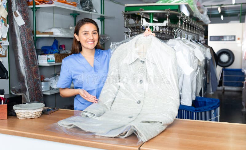 Portrait of Efficient Friendly Female Laundry Worker at Workplace Stock ...