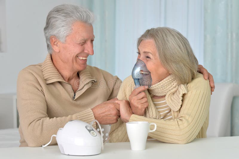 People making inhalation stock image. Image of elder - 268811759