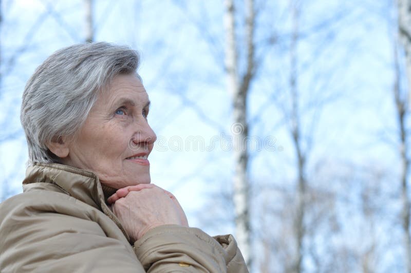 Portrait of an Elder Woman Out for a Walk in Nature in Spring Stock ...