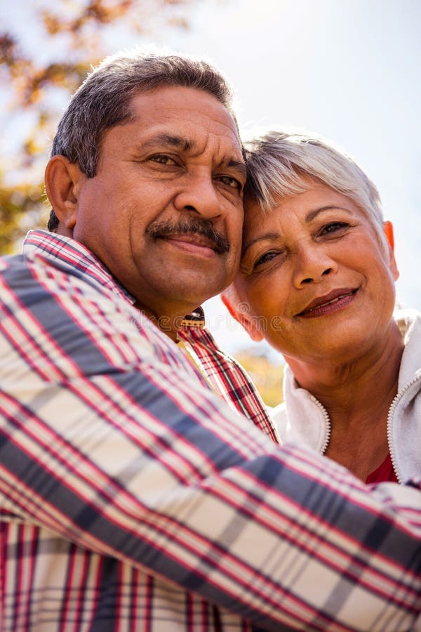 Portrait of Elderly Couple Embracing Stock Image - Image of fondness ...