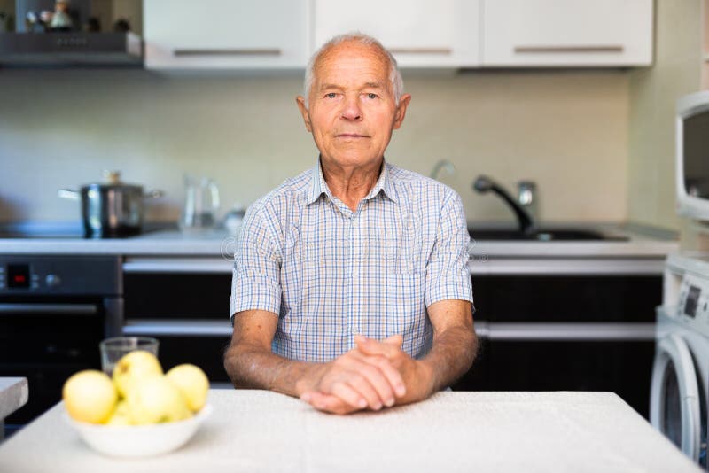 Portrait of an Elderly Lonely Man at Home in Kitchen Stock Photo ...