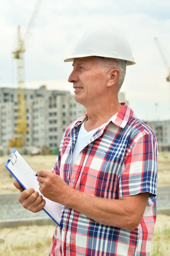 Portrait of an Elderly Man on a Construction Site Stock Photo - Image ...