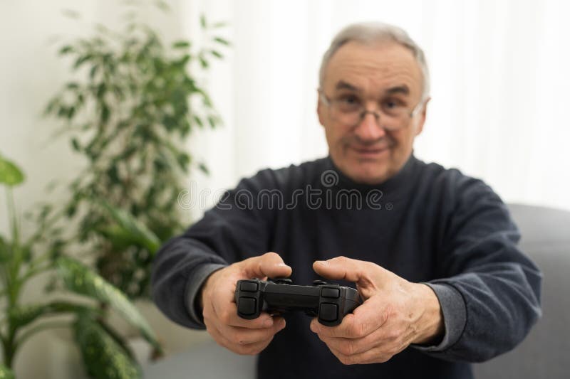 Portrait of Elderly Man Playing Video Games Stock Photo - Image of ages ...