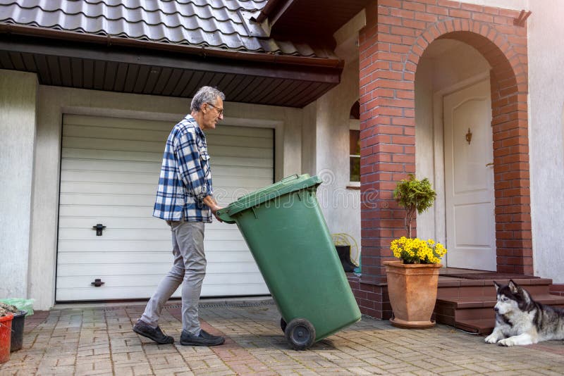 Senior Man Rolling Garbage Can Stock Photo - Image of domestic ...