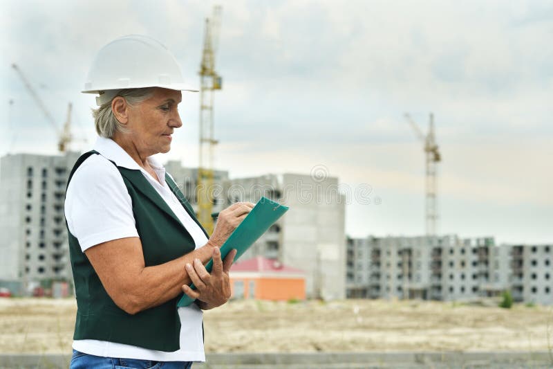 Portrait of an Elderly Woman on a Construction Site Stock Photo - Image ...