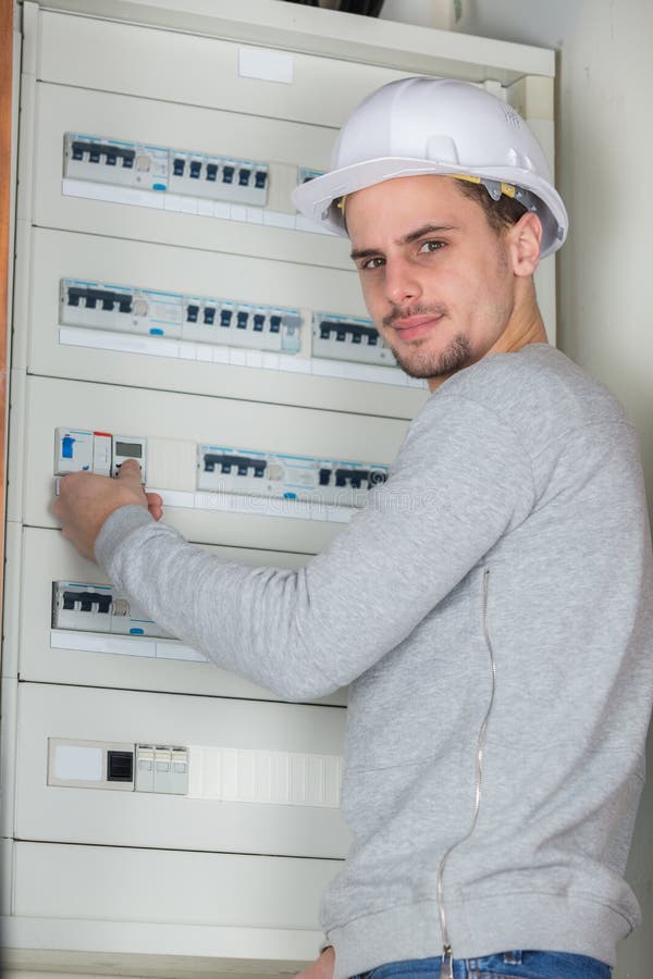 Portrait Electrician at Electrical Box Stock Photo - Image of ...