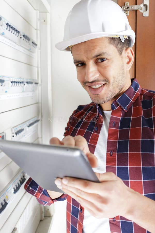 Portrait Electrician at Work Using Digital Tablet Stock Photo - Image ...