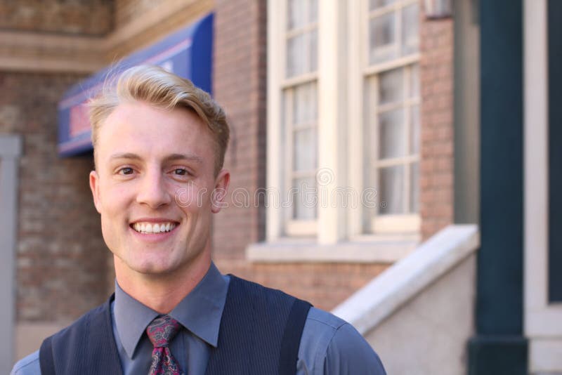 Portrait of an Elegant Young Man Outside with Copy Space on the Right ...